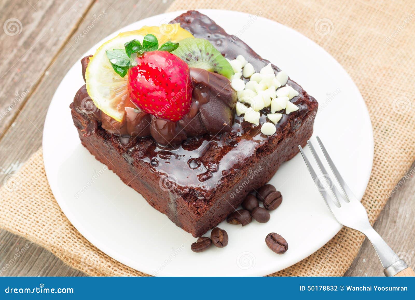 Piece of Chocolate Cake with Icing and Fresh Berry Stock Photo - Image ...