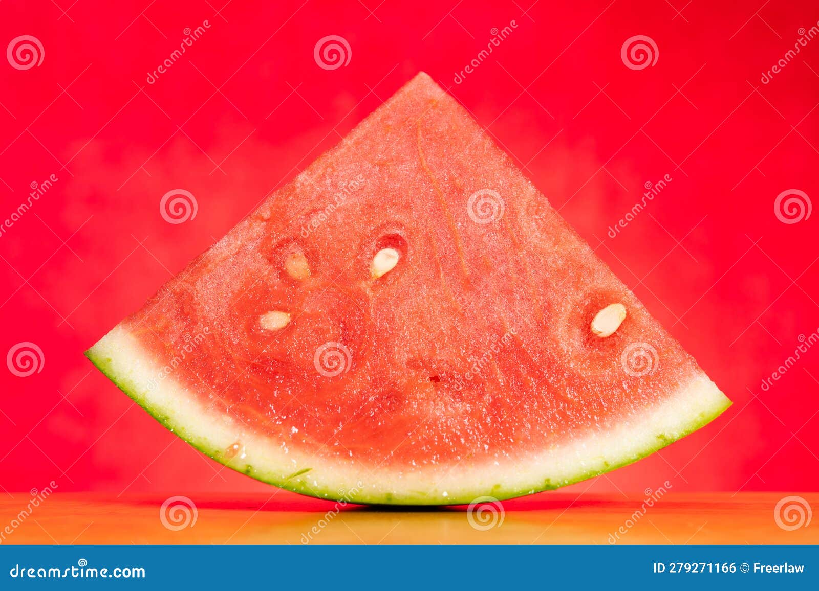 A Piece of Fresh Watermelon on Red at Horizontal Composition Stock ...