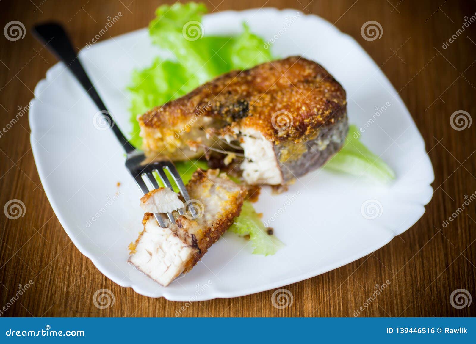 Piece of Fried Pike Fish in a Plate on a Wooden Stock Photo - Image of ...