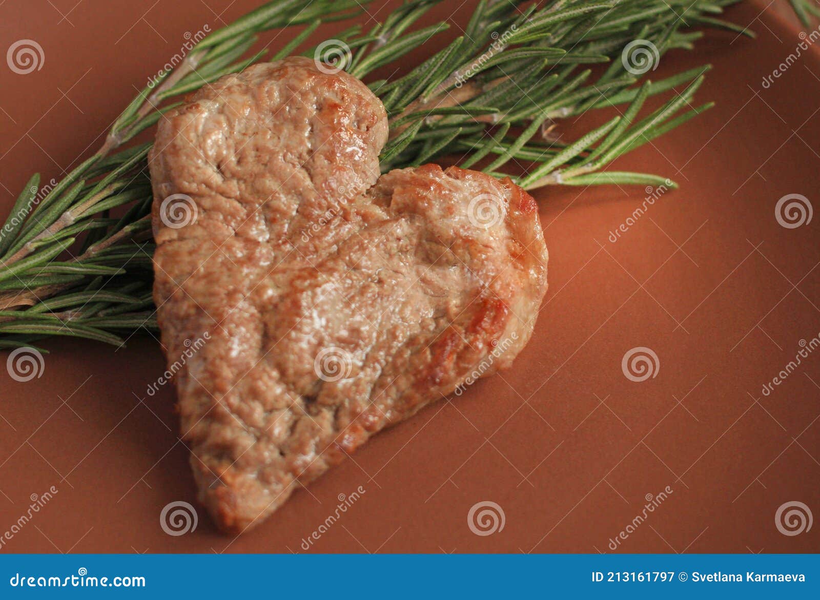 A Piece of Fried Pork Meat in the Shape of a Heart on a Plate Stock ...
