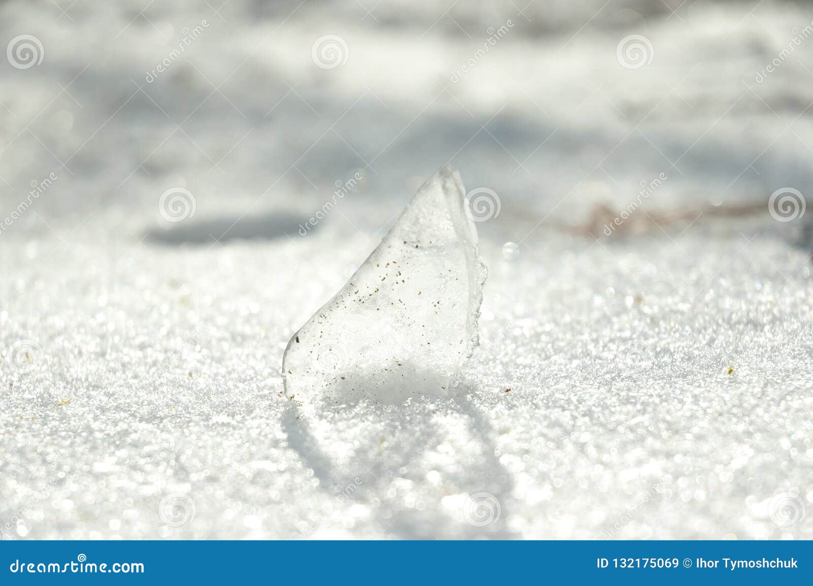 A Piece of Ice in the Sun on the Snow Stock Image - Image of hand ...