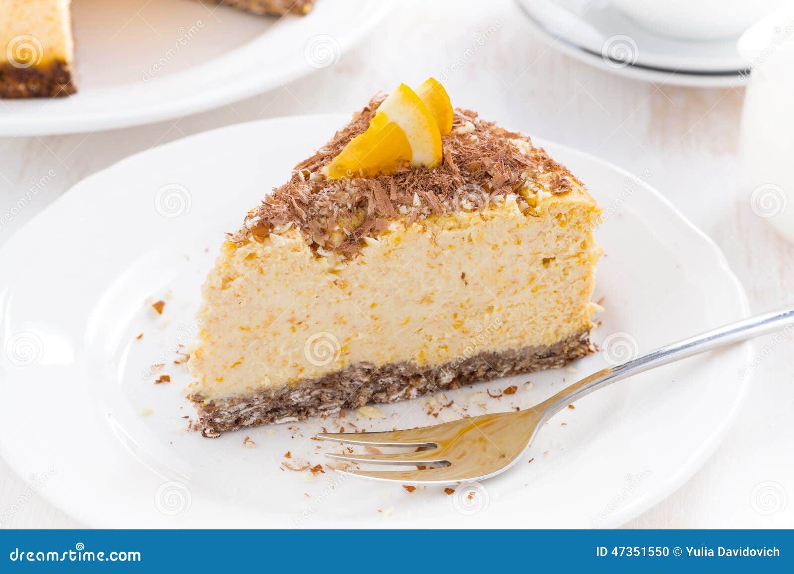 Piece of Orange Cheesecake with Chocolate on a Plate, Top View Stock ...