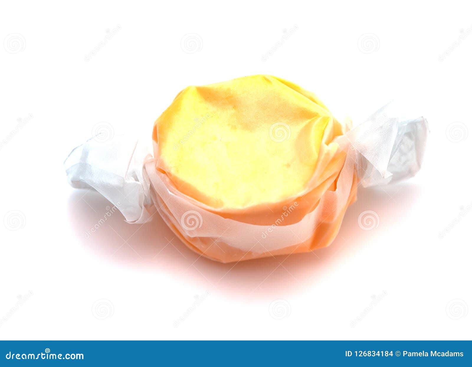 Piece of Orange Salt Water Taffy on a White Background Stock Photo ...