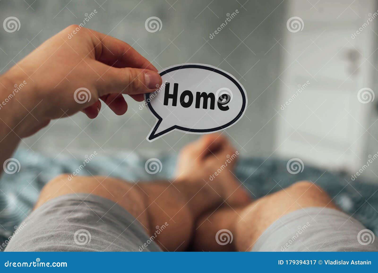 A Piece of Paper from a Man Lying on a Bed with the Word Home on it ...