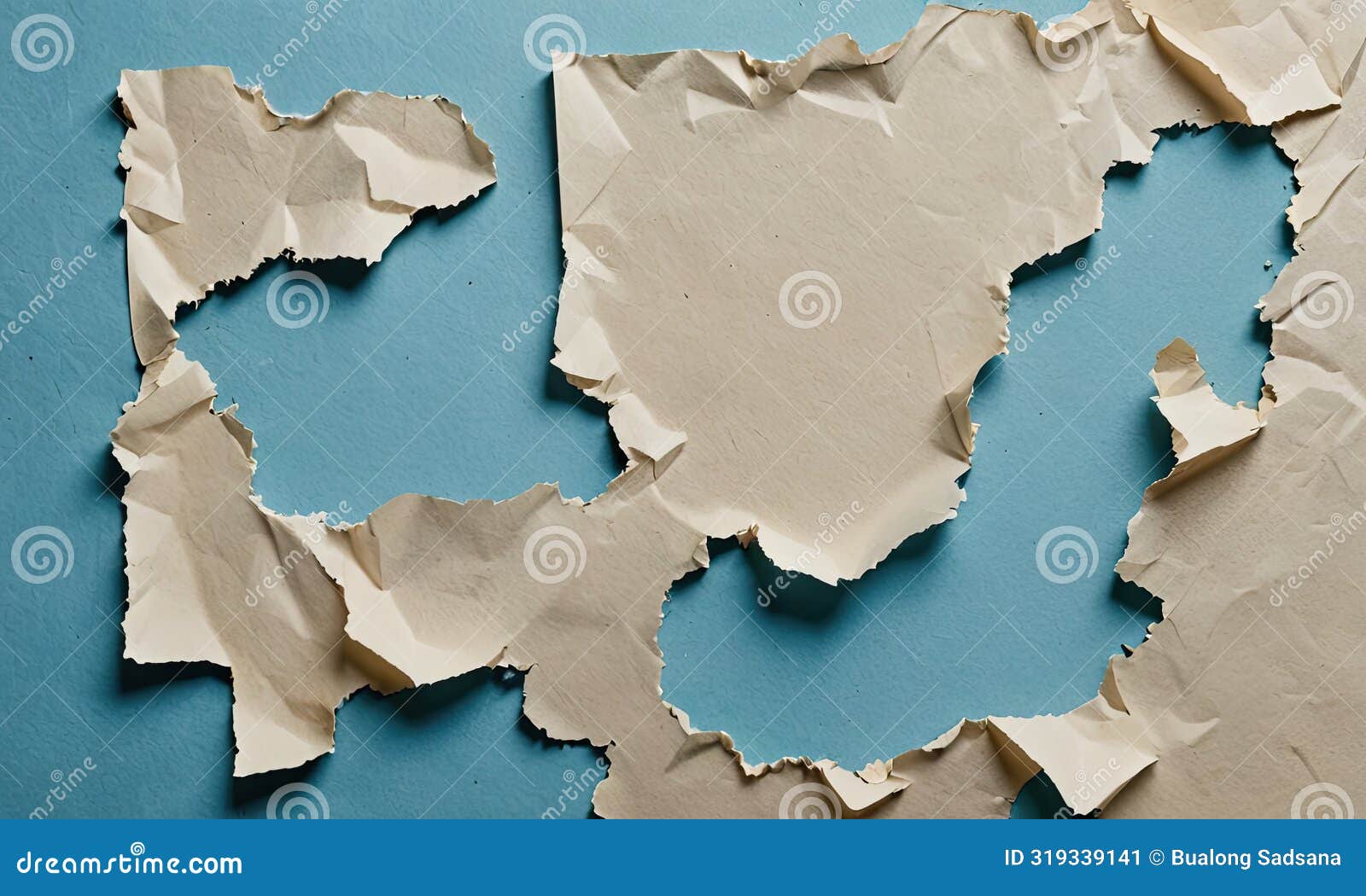 A Piece of Paper is Torn in Half, with the Words "ouch" Written on it ...