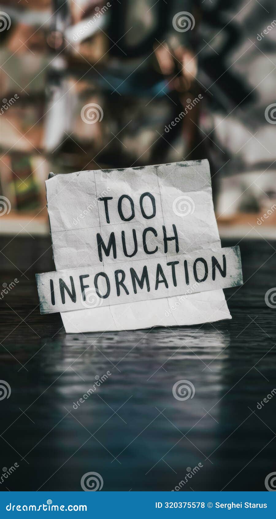 A Piece of a Paper with the Words Too Much Information Written on it ...
