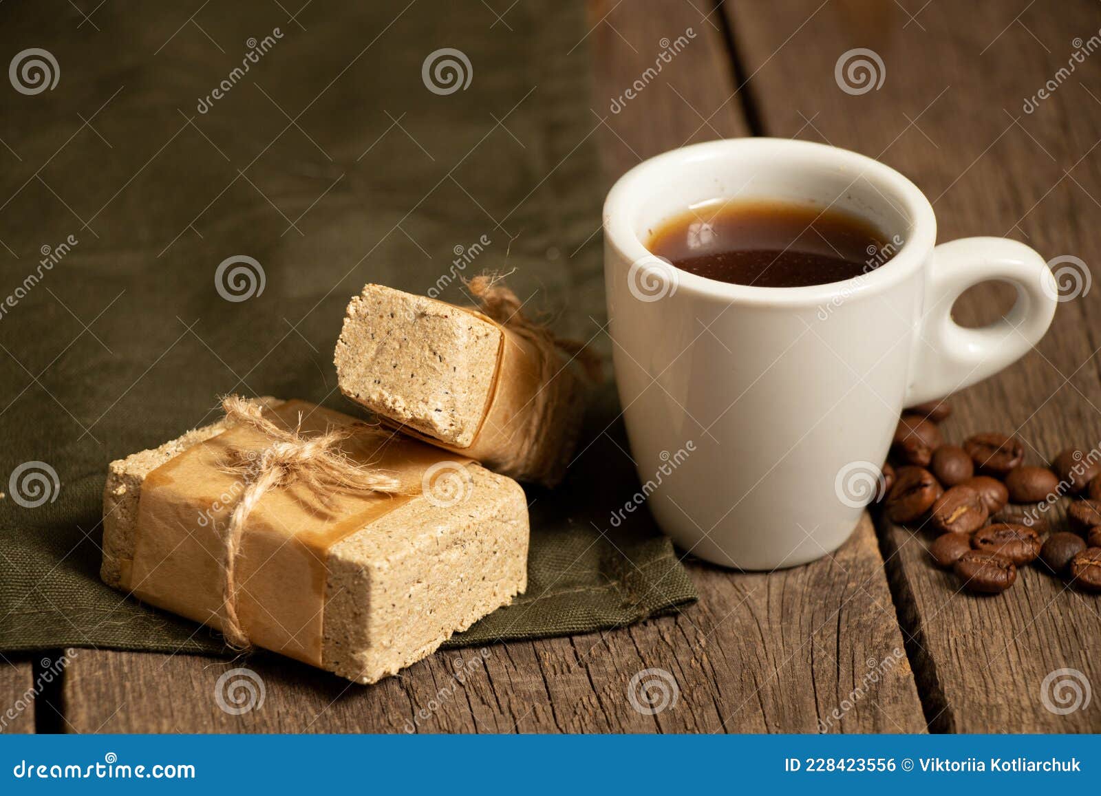 A Piece of Peanut Halva and a Cup of Coffee on the Table for Breakfast ...