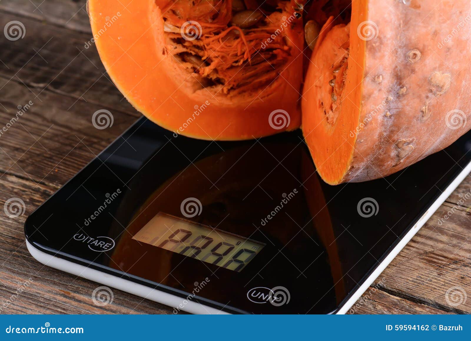 Piece of pumpkin on scales stock photo. Image of inside - 59594162