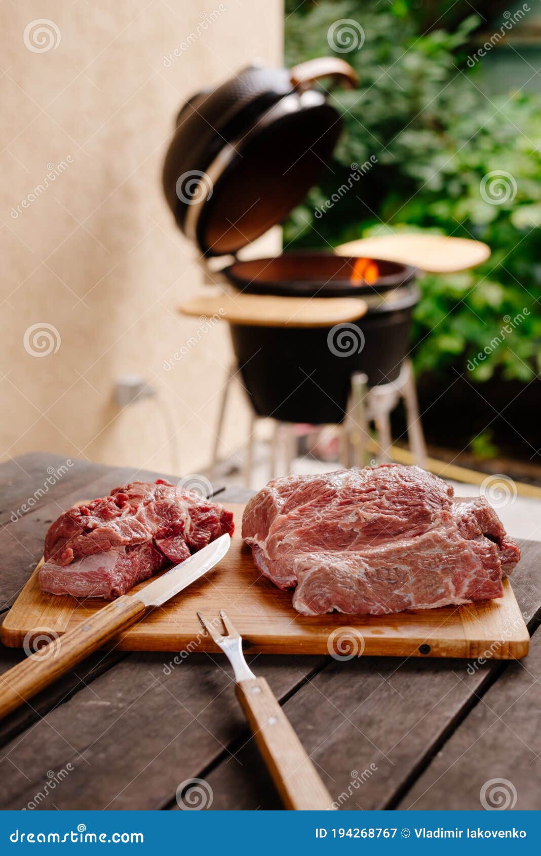Beef Half Carcasses Hanging On Hooks In The Slaughterhouse. Meat ...