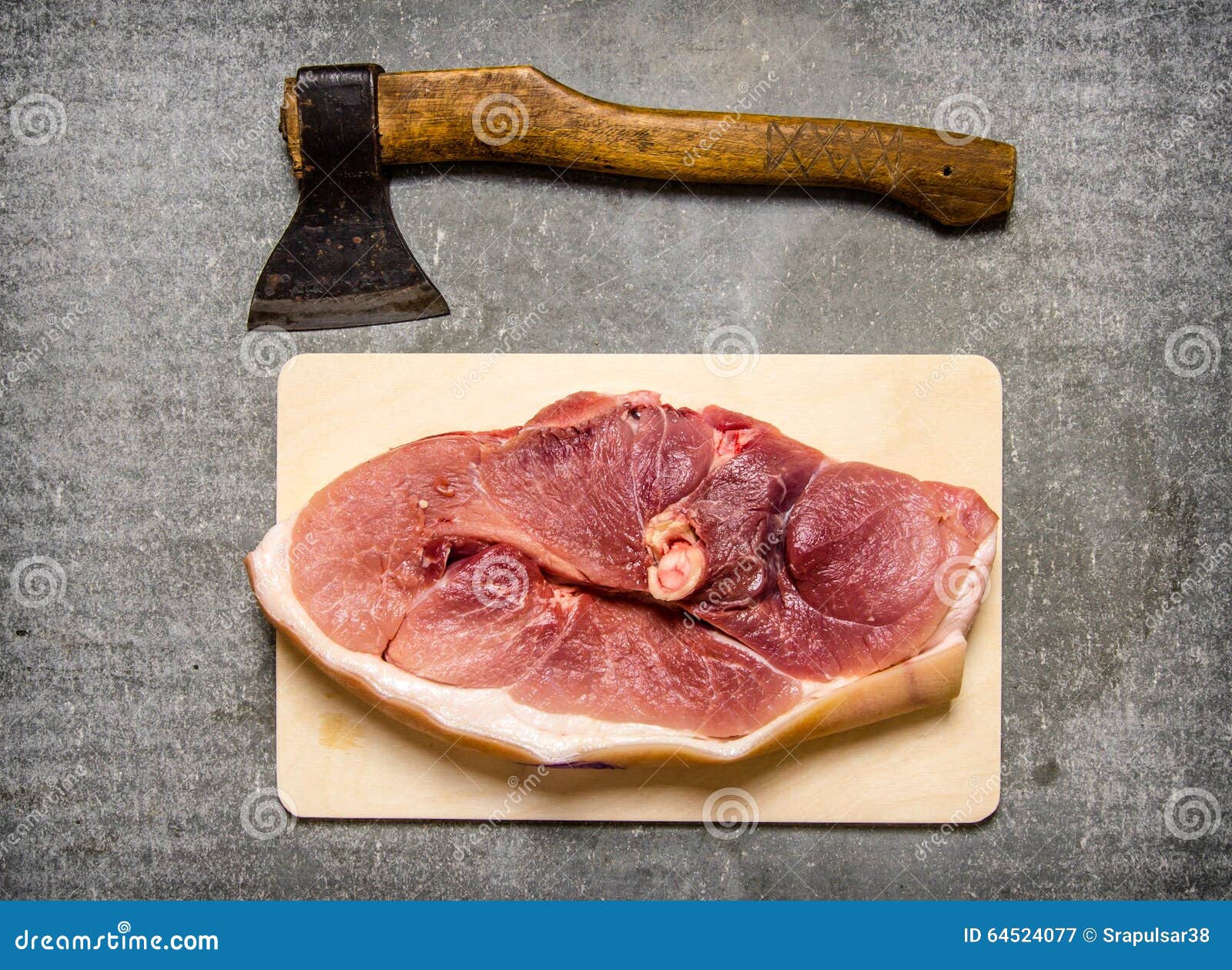 A Piece of Raw Pork with a Hatchet for Meat Cutting. Stock Image ...