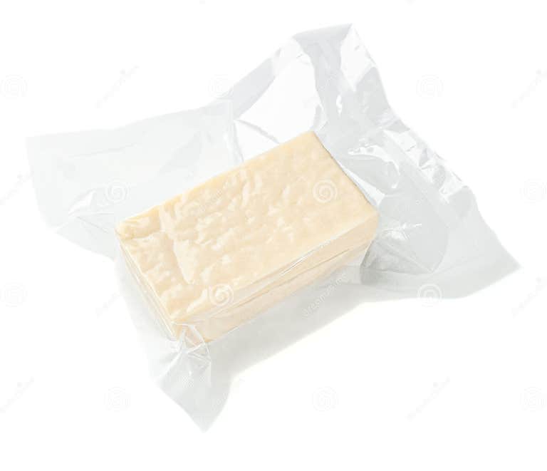 A Piece of Rectangular Cheese in a Vacuum Package. View from Above ...
