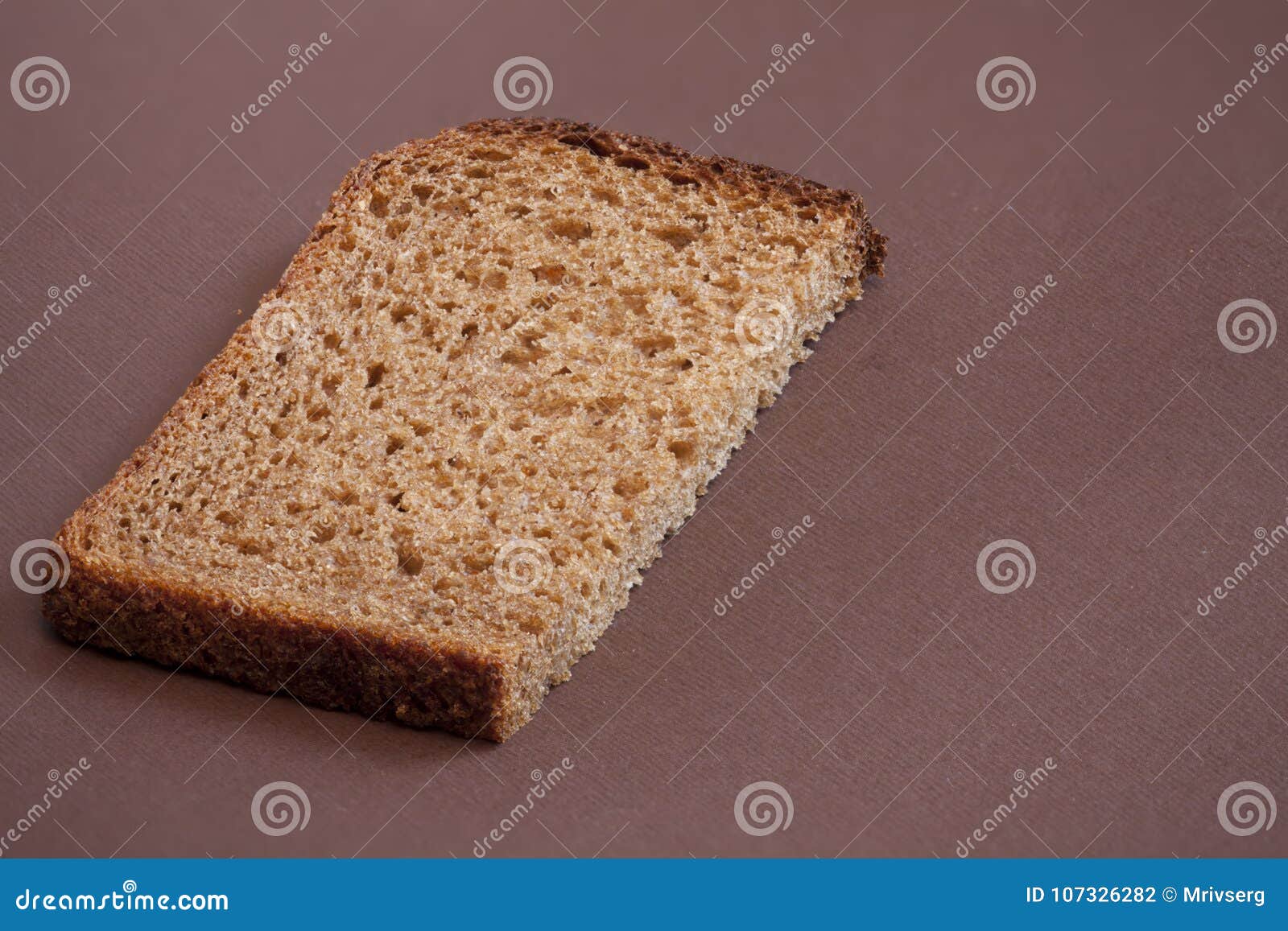 Piece of rough rye bread stock photo. Image of thin - 107326282