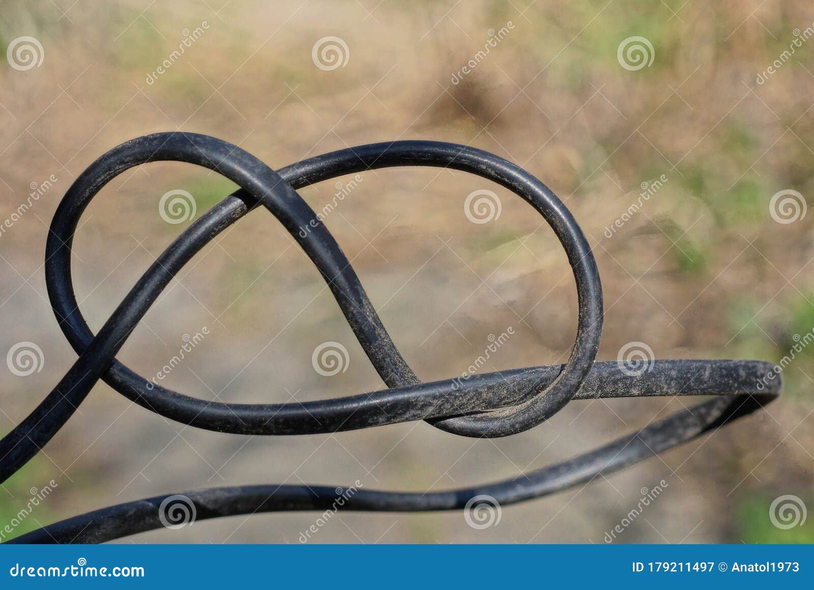 A Piece of Tangled Black Electrical Wire Stock Image - Image of ...