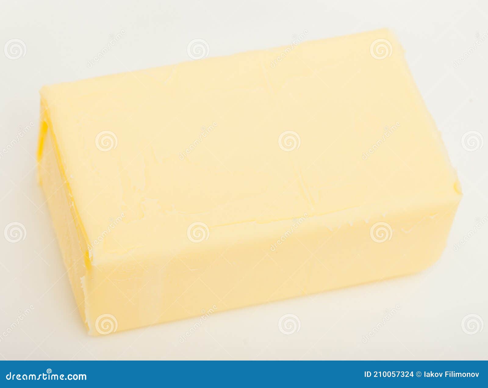 Butter on white background stock photo. Image of cholesterol - 210057324