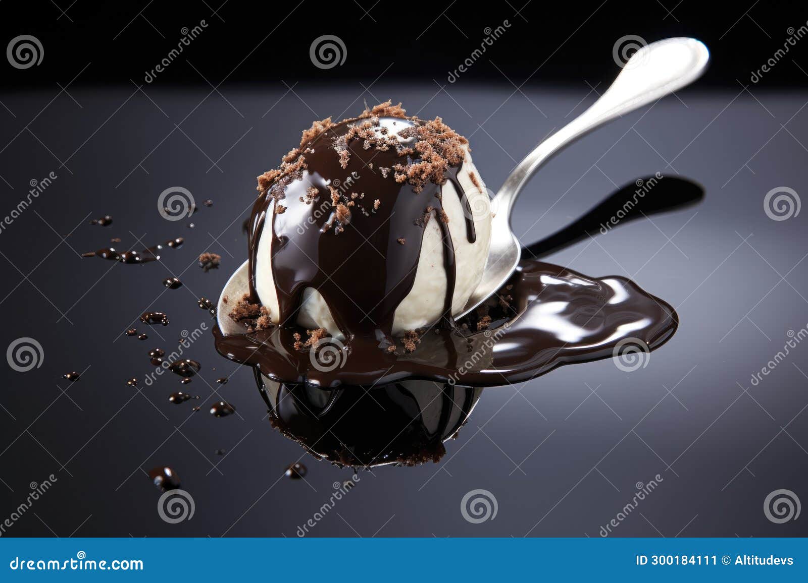 A Piece of Truffle Candy on a Spoon with Melted Chocolate Dripping Off ...
