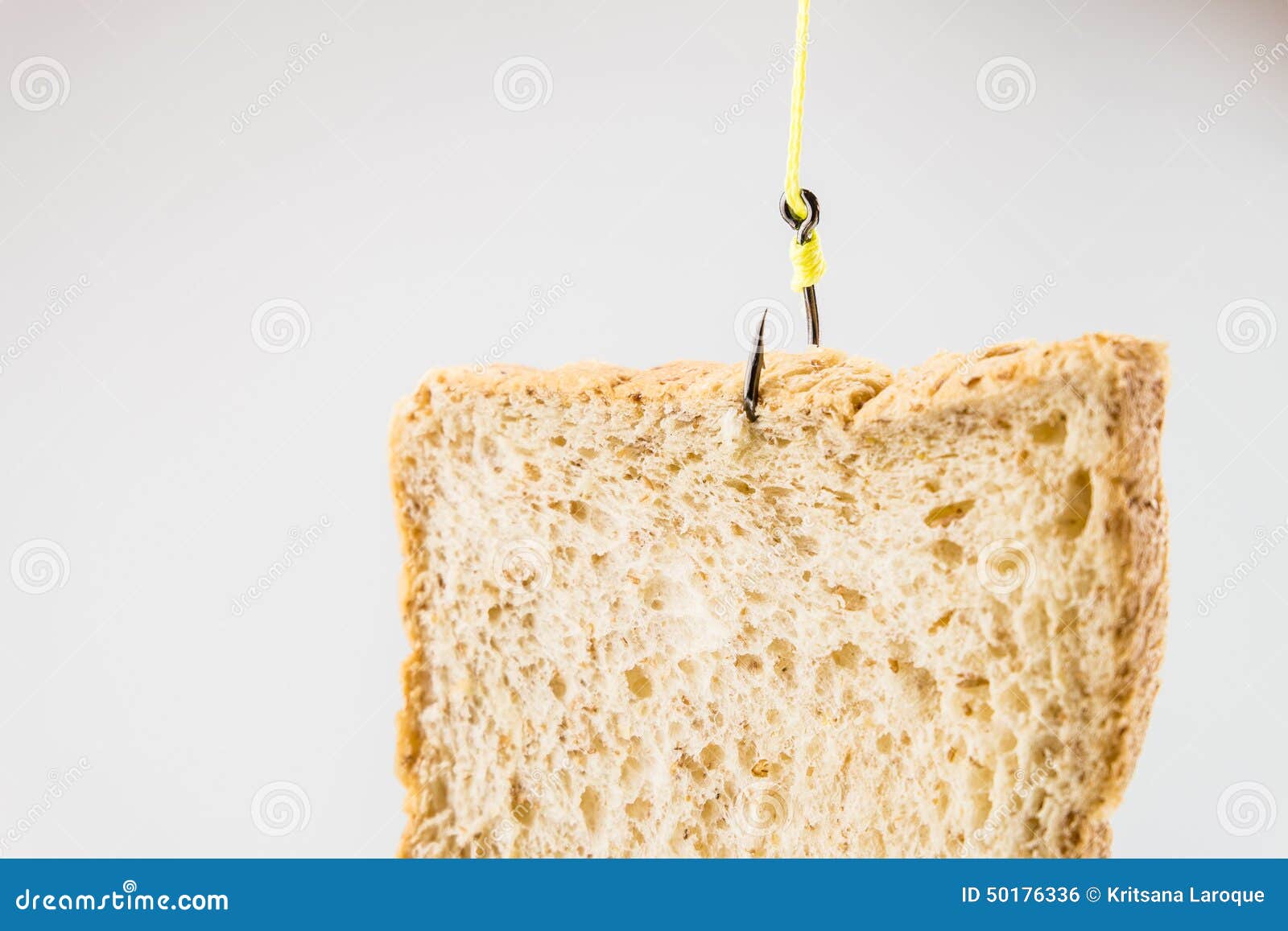 Piece of White Bread Hanging on a Fishing Hook Stock Photo - Image of ...