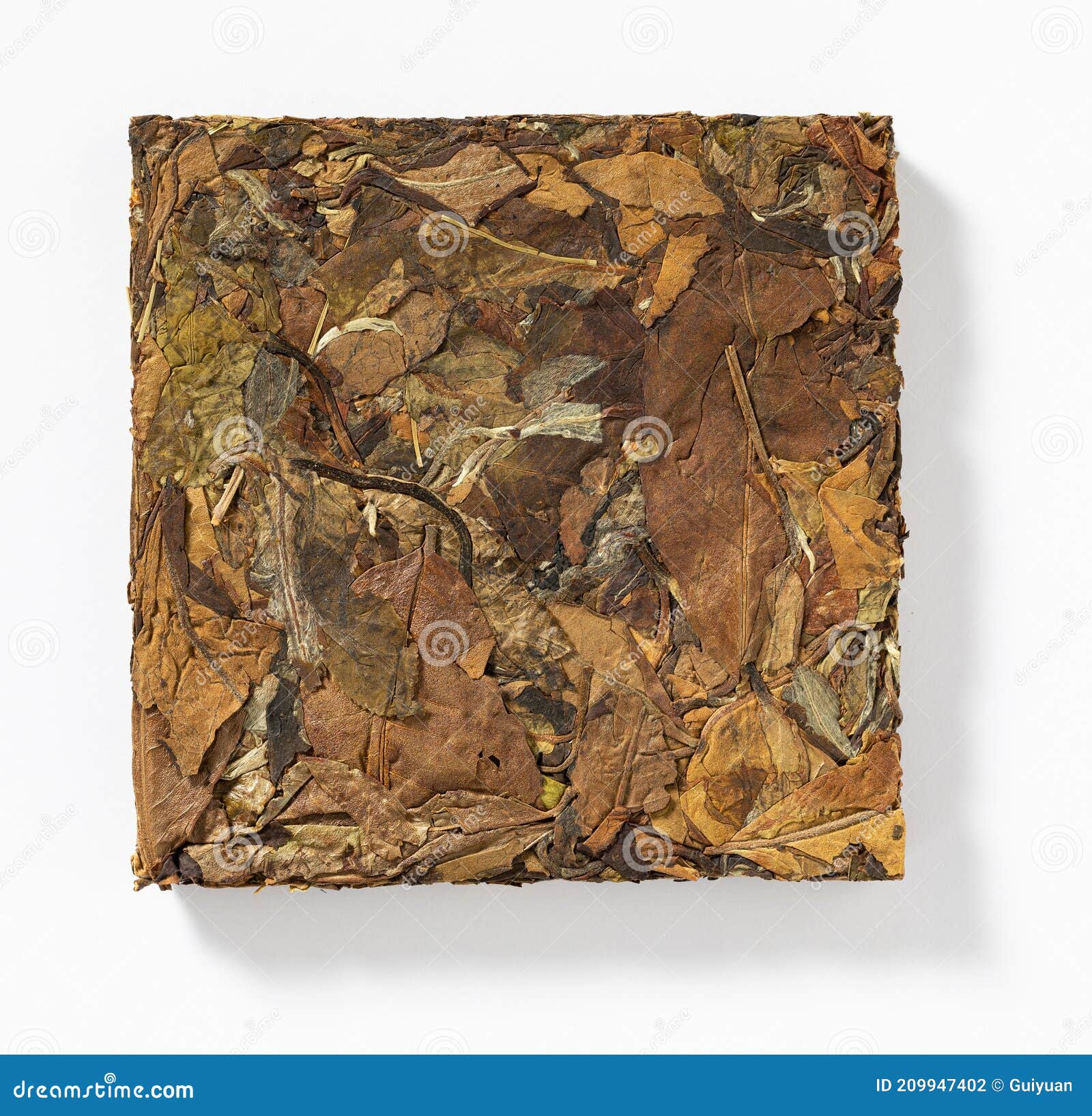 A Piece of White Tea Cake Pressed into a Square Shape on a White ...