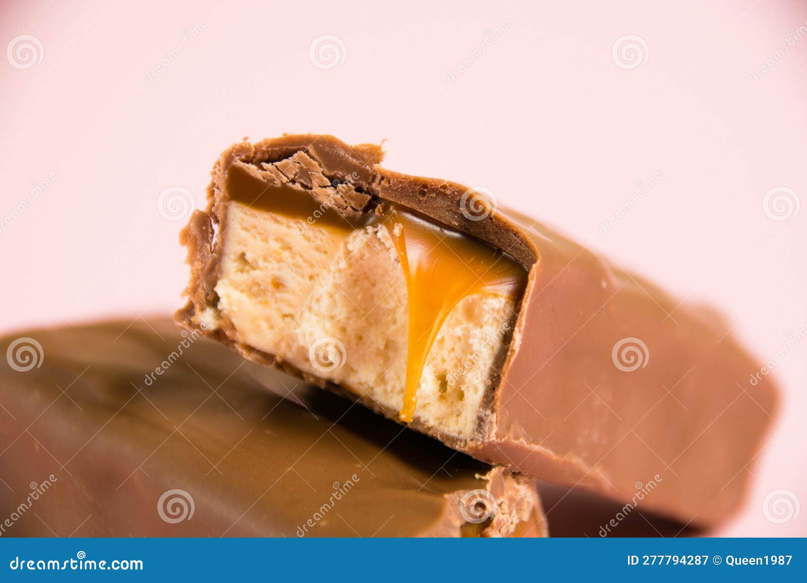 Pieces of Appetizing Chocolate Bar with Caramel and Nougat Macro on a ...