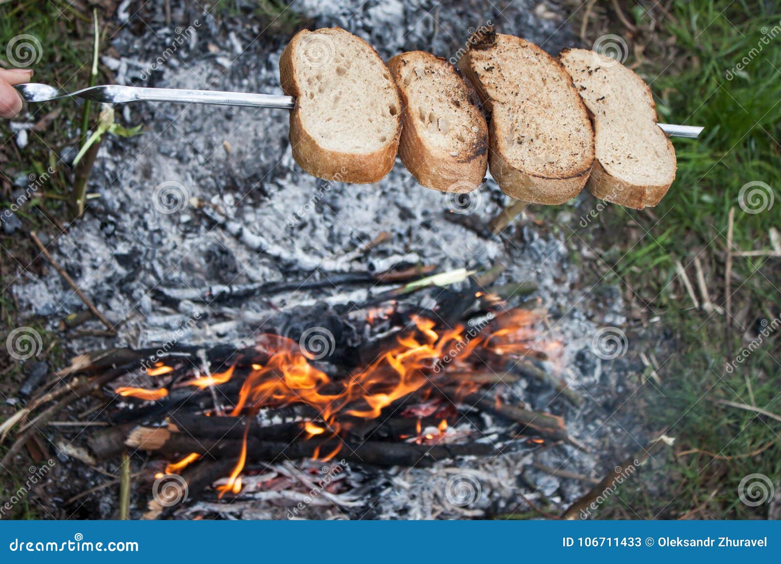 Bread roasting on the fire stock image. Image of smoldering - 106711433