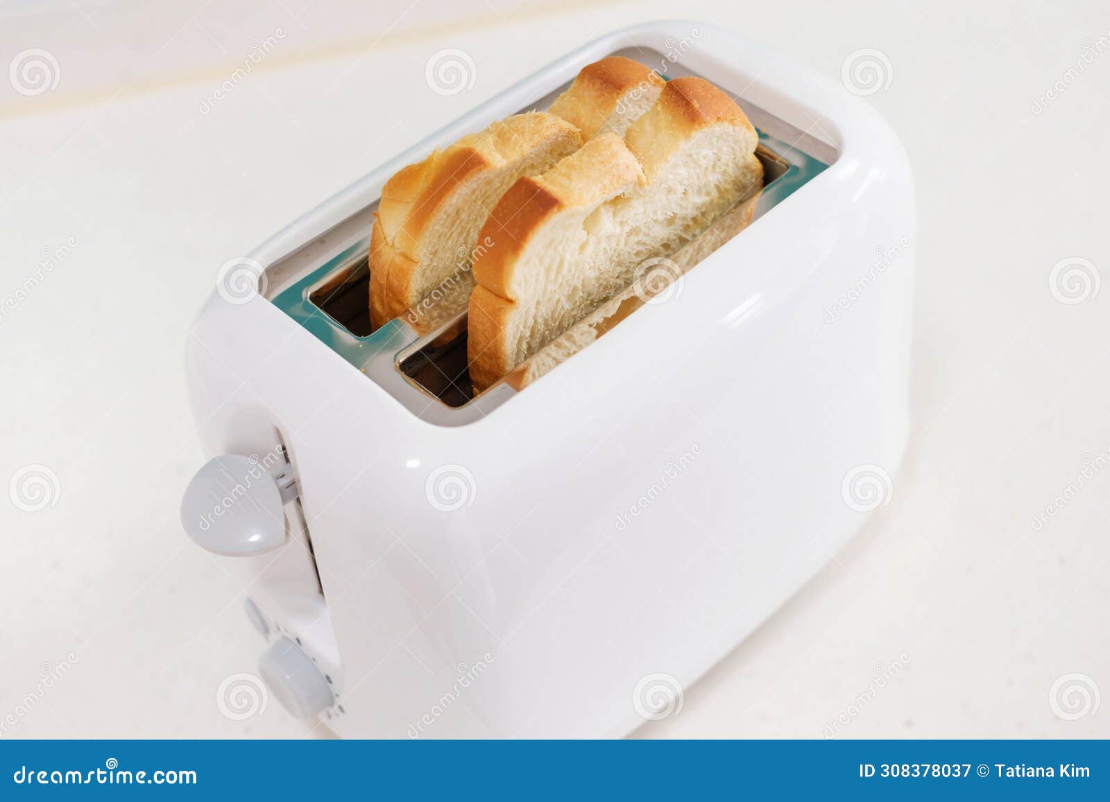 Pieces of Bread in a Toaster on White Background, Side View. Stock ...