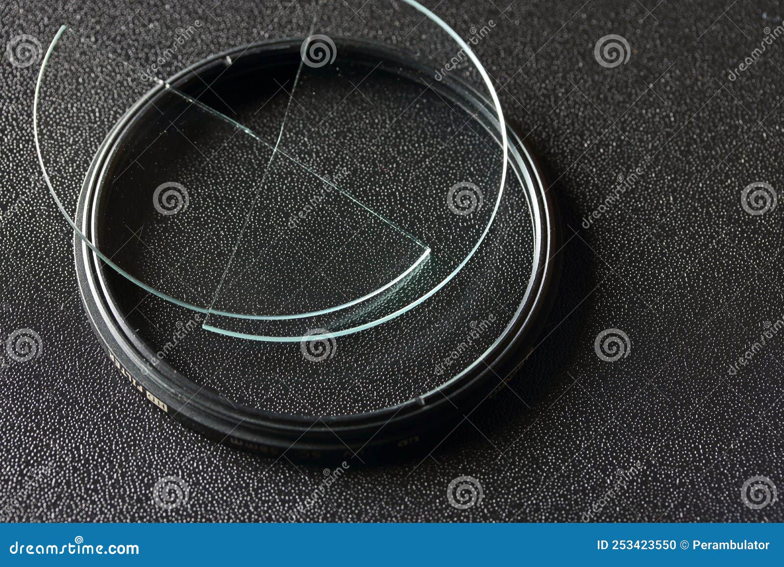 PIECES of BROKEN CIRCULAR GLASS of a LENS FILTER Stock Photo - Image of ...