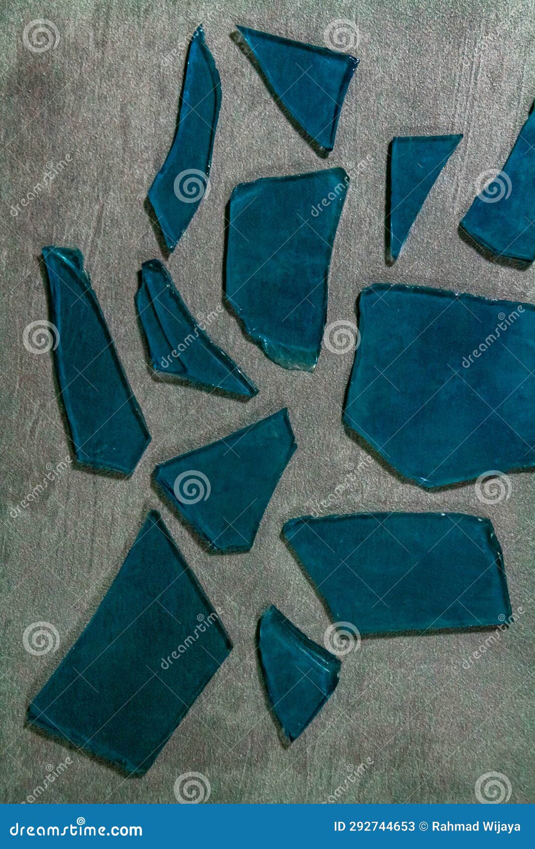 Pieces of Broken Glass on a Gray Background. Collage. Stock Image ...