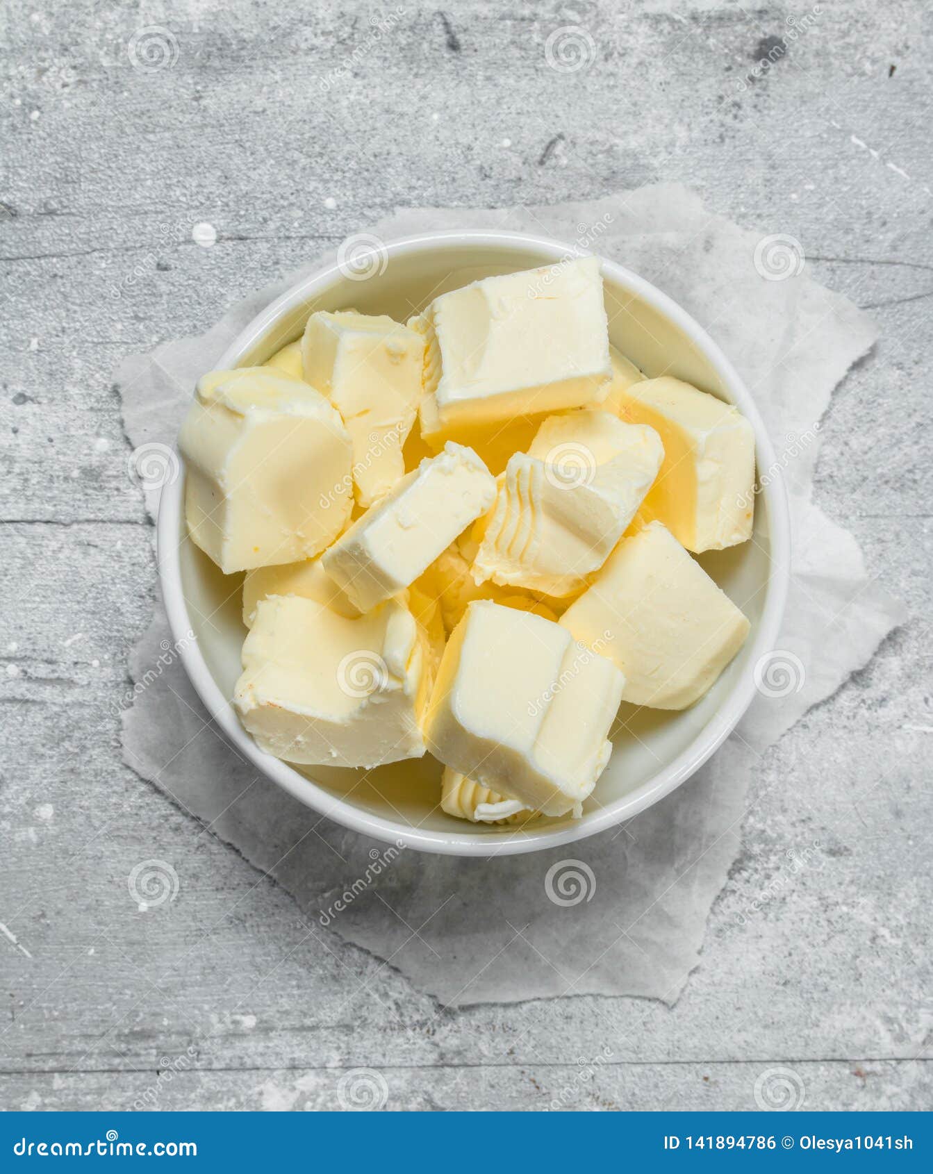 Pieces of Butter in the Bowl Stock Photo - Image of natural, yellow ...
