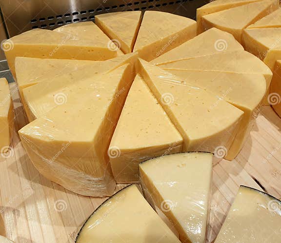 Pieces of Cheese Cut into Triangles, Soft Selective Focus Stock Image ...