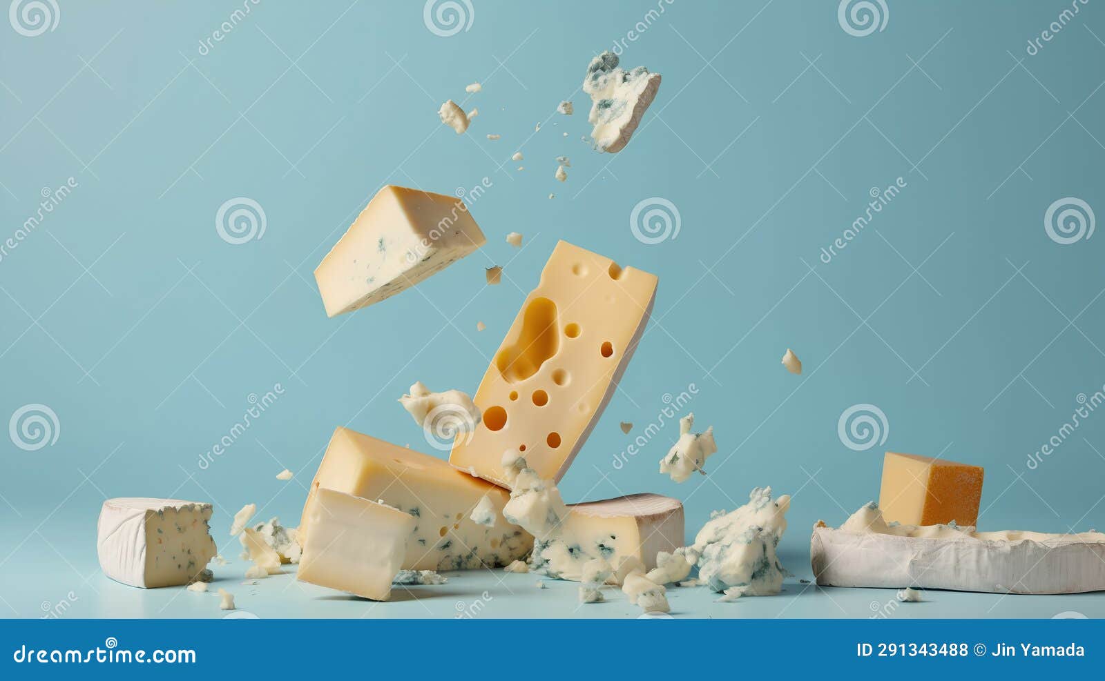 Pieces of Cheese Falling into the Air on a Blue Background. Stock ...