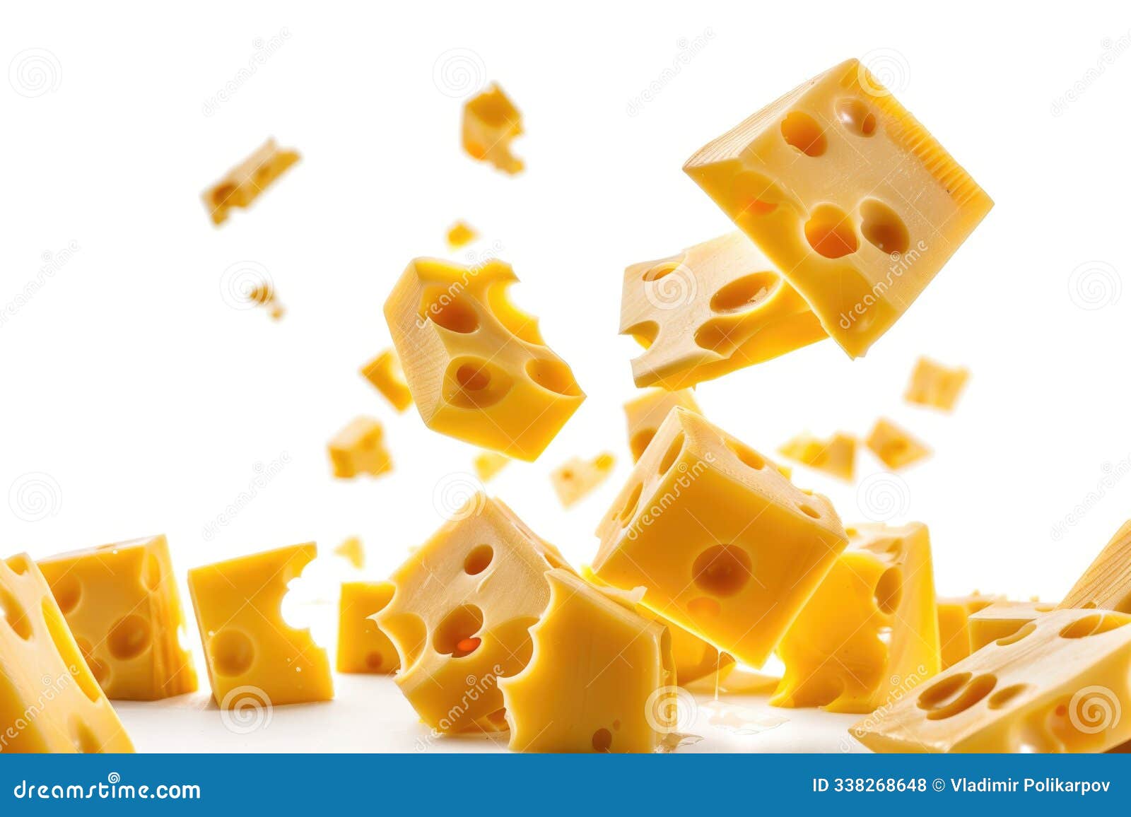 Pieces of Cheese Falling from a White Surface, Perfect for Food or ...