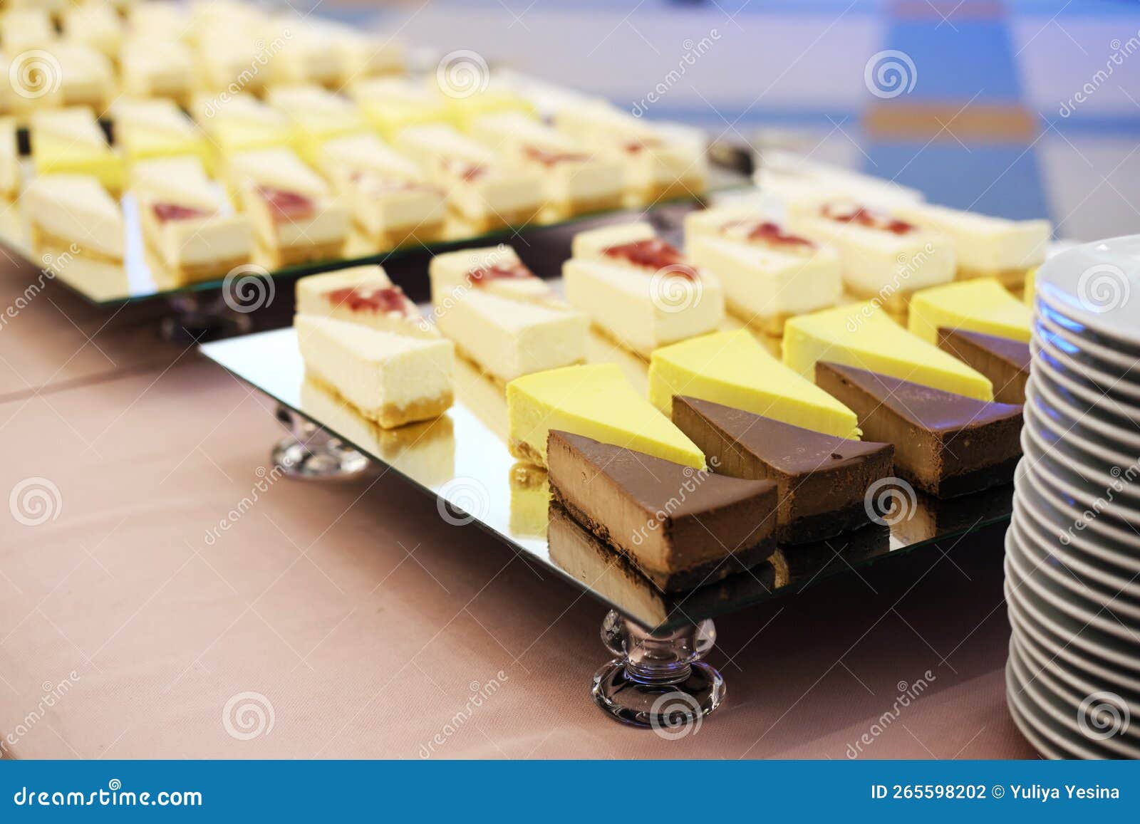 Pieces of Cheesecakes on a Mirrored Tray on the Buffet Table Stock ...