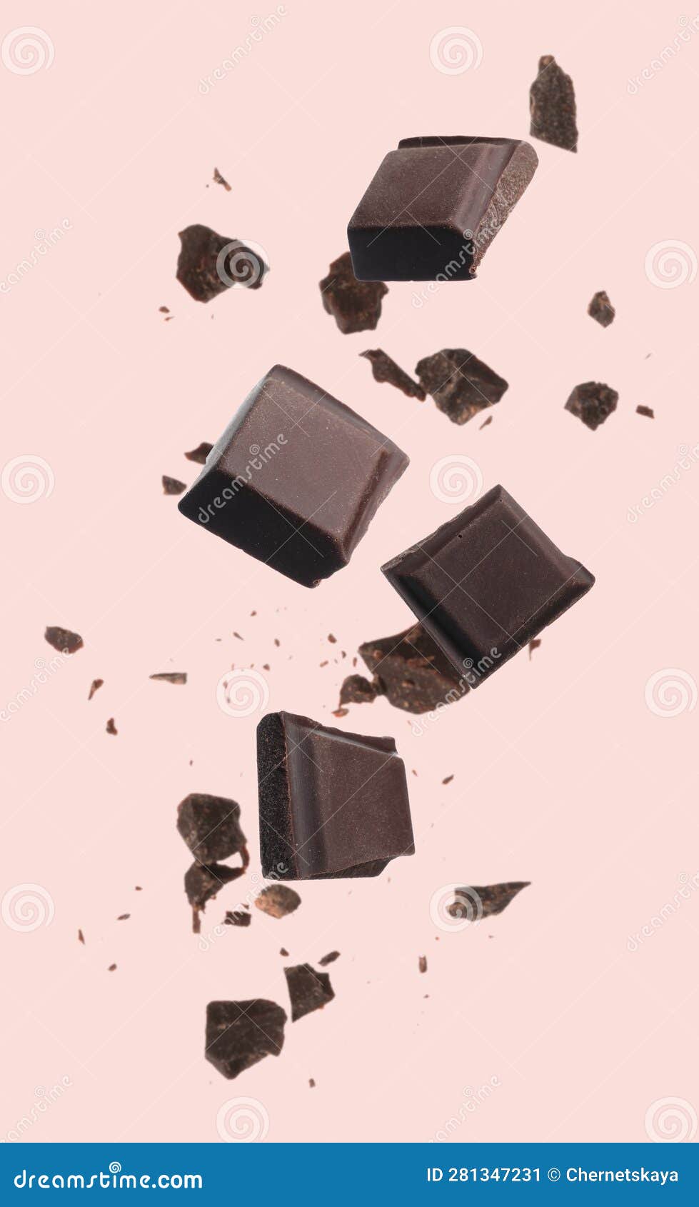Pieces of Chocolate Bar Falling on Beige Background Stock Image - Image ...