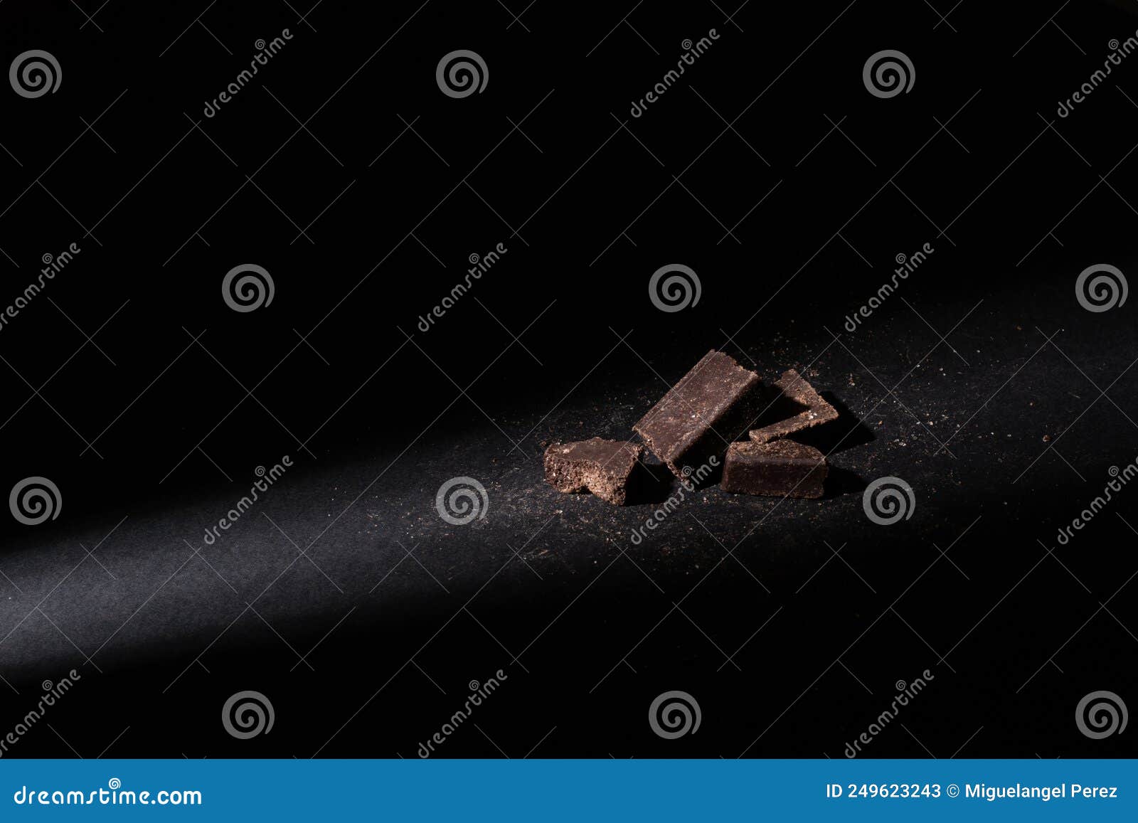 Pieces of Chocolate Bar Illuminated with a Soft Point Light Stock Image ...