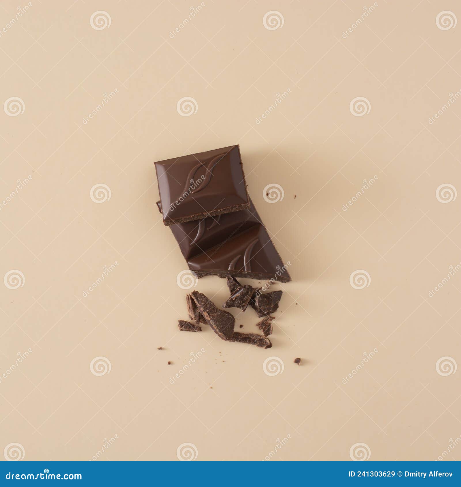 Pieces of Chocolate and Chocolate Chips on a Sand-colored Background ...