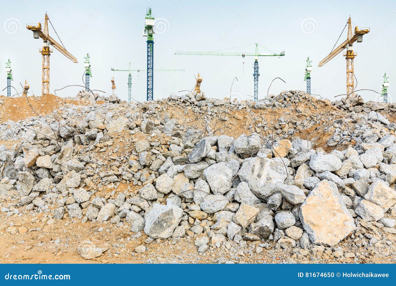 Pieces of Concrete and Brick Rubble Debris and Giant Cranes on ...