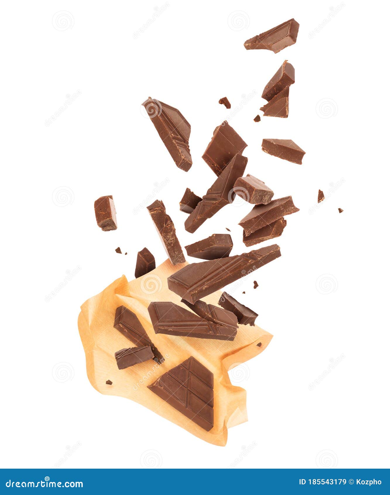 Pieces of Crushed Chocolate are Fly Out from a Paper Wrapper, Isolated ...