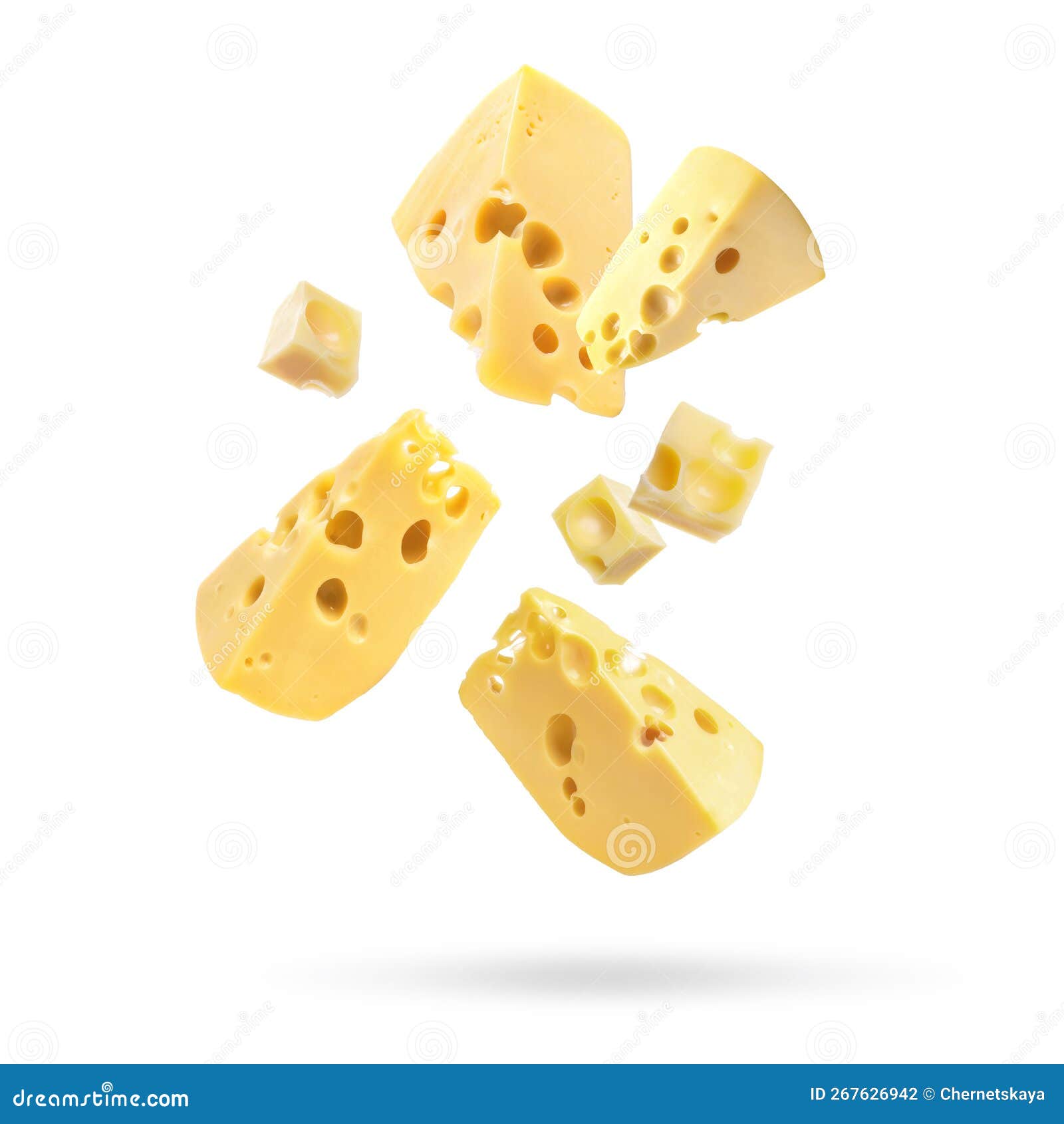 Pieces of Delicious Cheese Falling on White Background Stock Photo ...