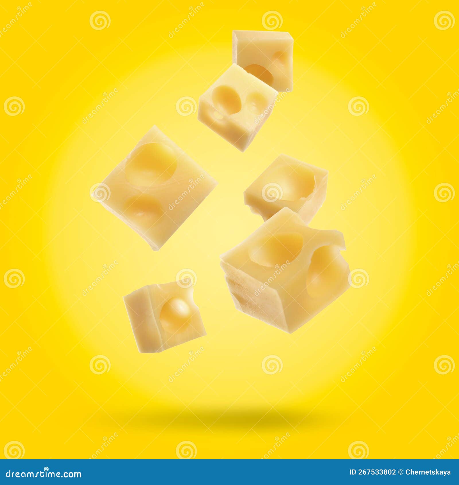 Pieces of Delicious Cheese Falling on Yellow Stock Photo - Image of ...