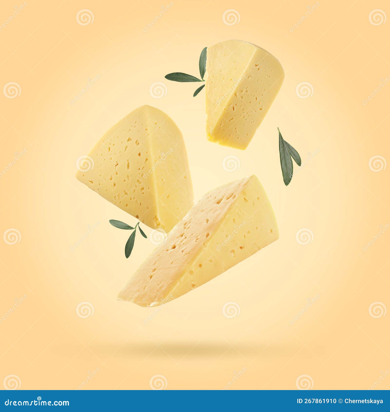 Pieces of Delicious Cheese and Leaves Falling on Beige Background Stock ...