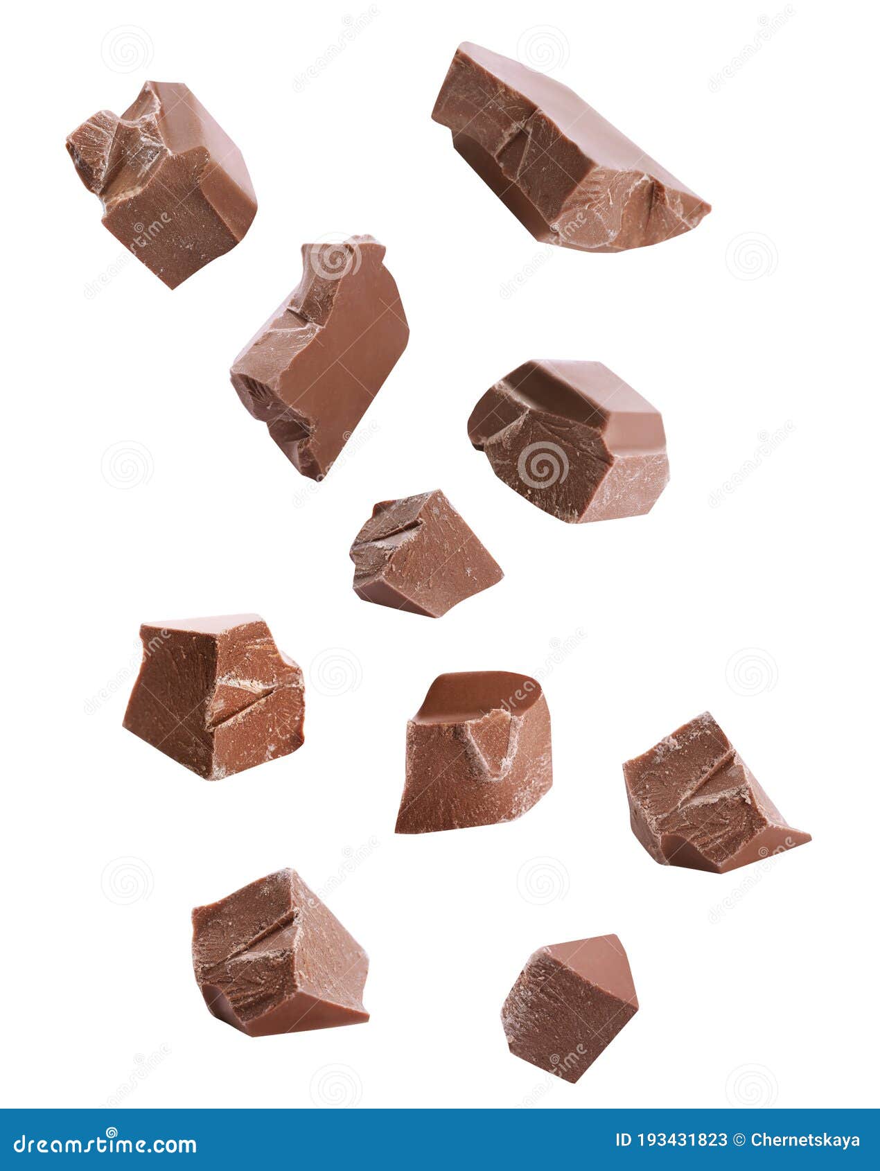 Pieces of Delicious Milk Chocolate Falling on Background Stock Image ...