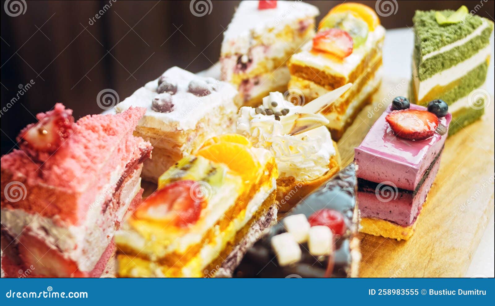 Pieces of Different Cakes on a Retro-style Baking Tray. Slider and ...