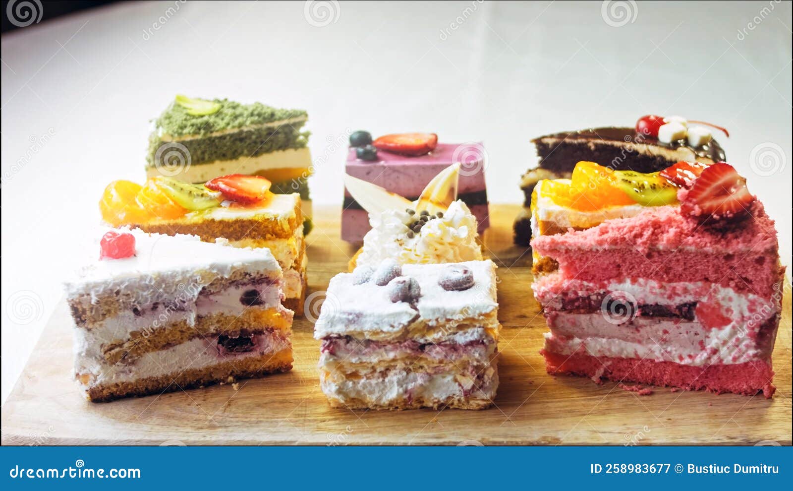 Pieces of Different Cakes on a Retro-style Baking Tray. Slider and ...
