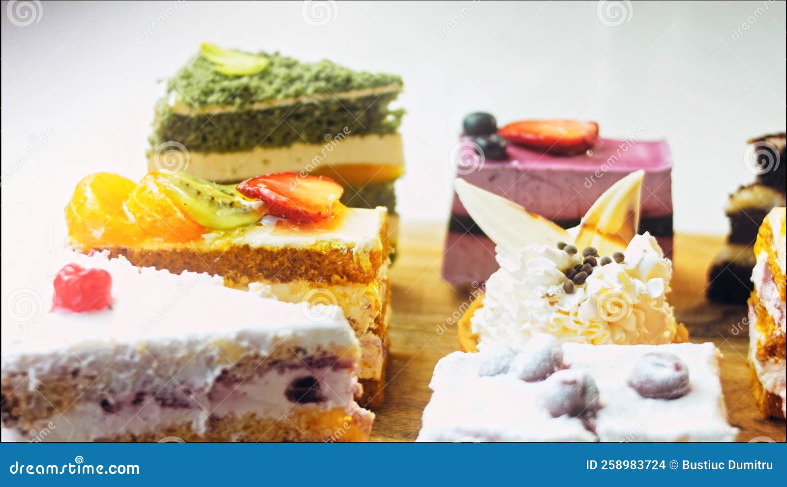 Pieces of Different Cakes on a Retro-style Baking Tray. Slider and ...