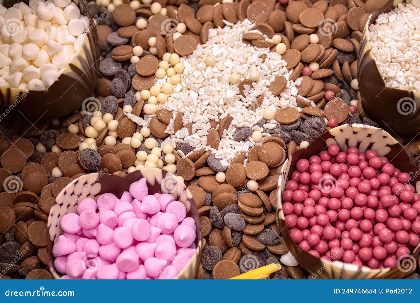 Pieces of Different Colored Chocolate and Chocolate Candies Top View ...