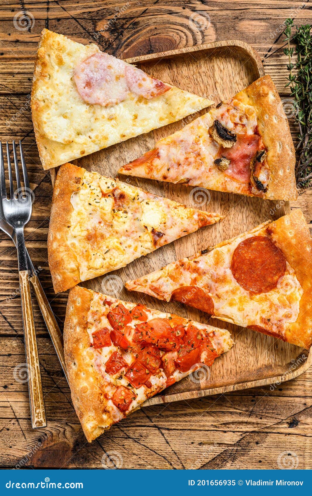 Pieces of Different Pizza Various Types. Wooden Background Stock Image ...