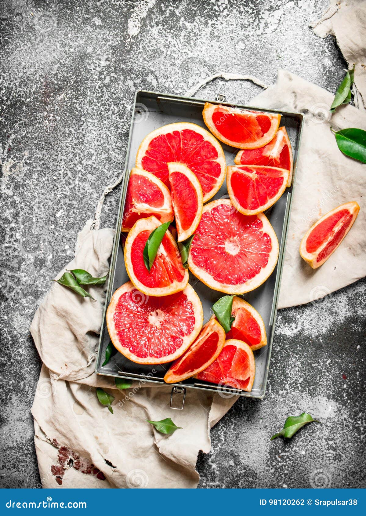 Pieces of Fresh Grapefruit in the Box. Stock Photo - Image of napkin ...
