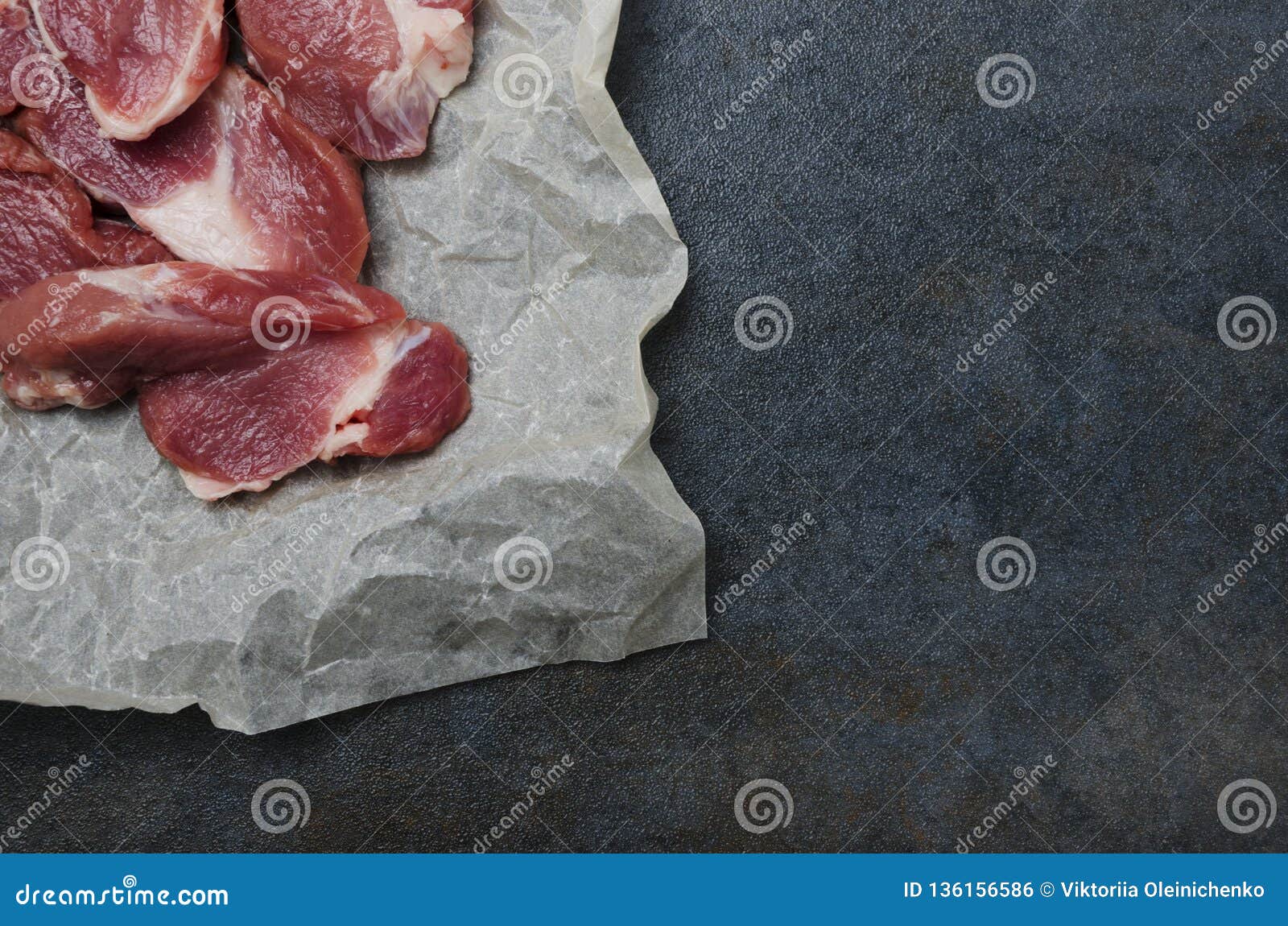 Slices of Raw Meat on Backing Paper in the Kitchen Stock Photo - Image ...