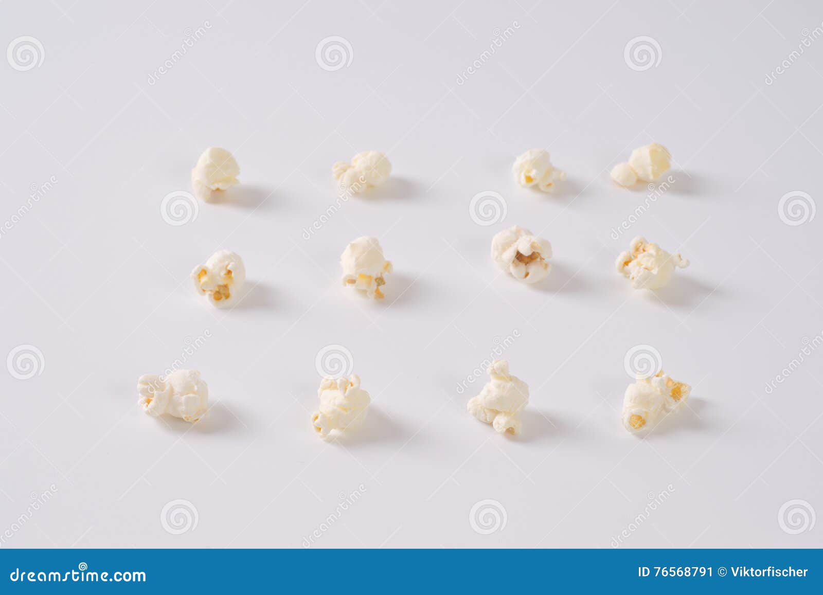 Pieces of fresh popcorn stock image. Image of line, indulgence - 76568791