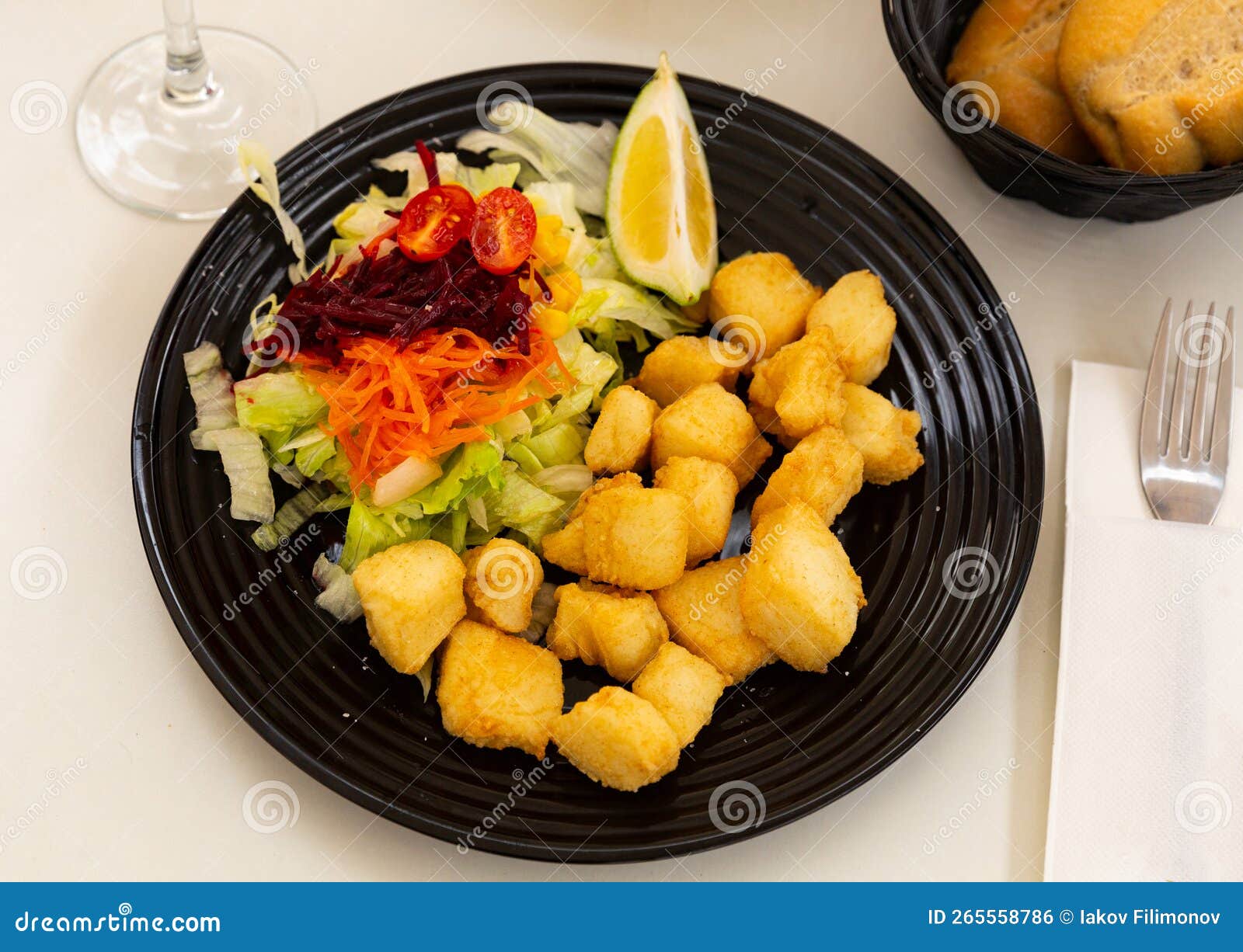 Pieces of Fried Cuttlefish Breaded with Vegetables Stock Photo - Image ...
