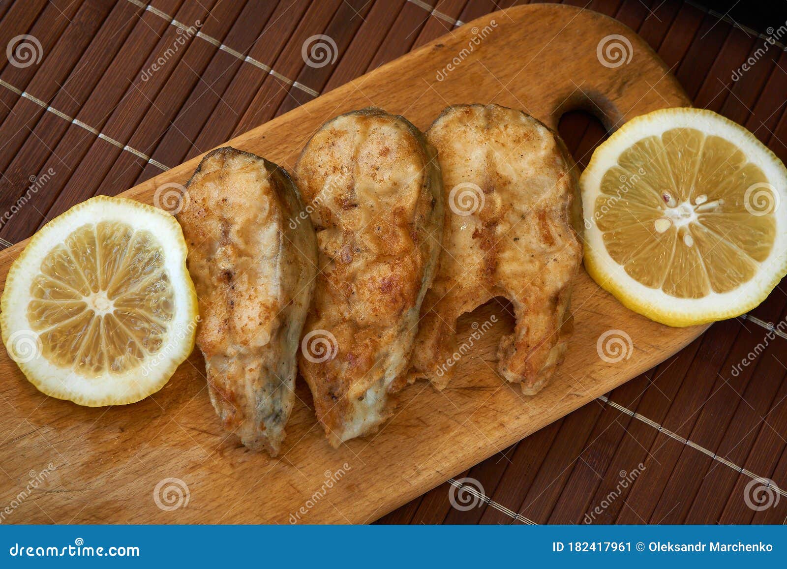 Pieces of Fried Fish with Lemon Wedges. Stock Image - Image of beans ...